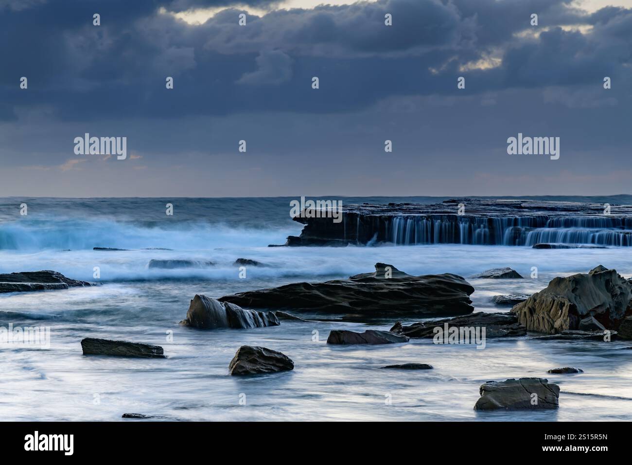 Autumn sunrise seascape with clouds and cascades at The Skillion in ...