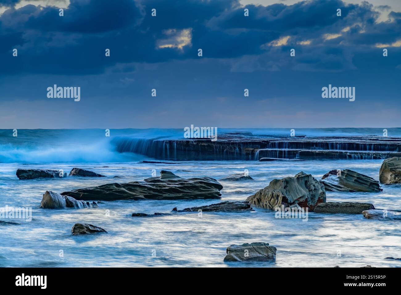 Autumn sunrise seascape with clouds and cascades at The Skillion in ...