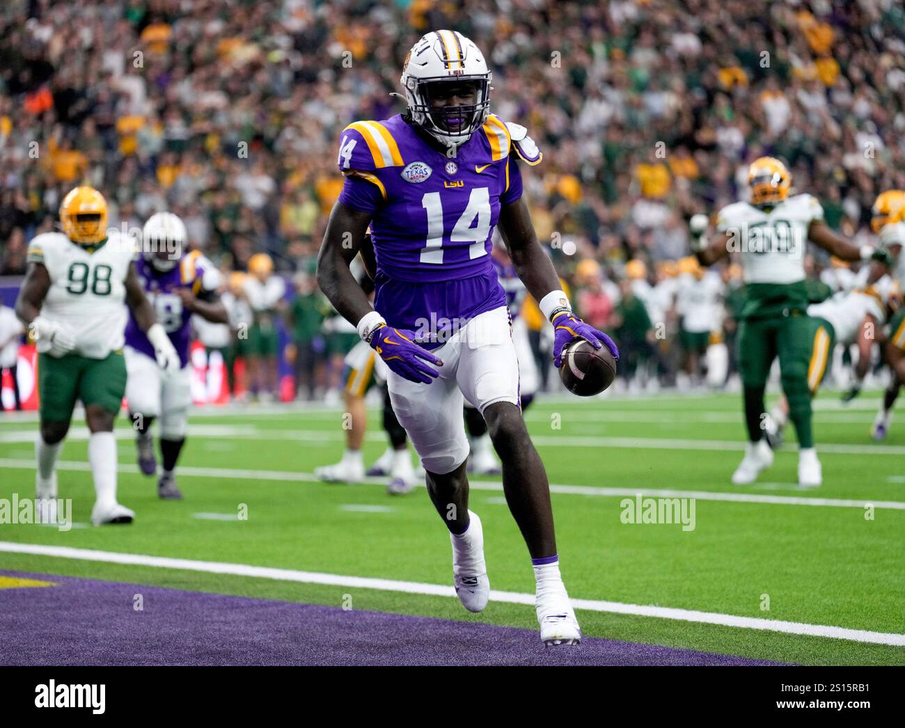 LSU tight end Trey'Dez Green (14) catches a touchdown pass from ...