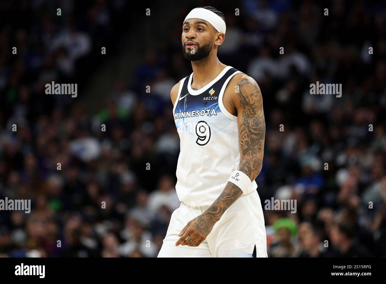 Minnesota Timberwolves guard Nickeil Alexander-Walker (9) looks on ...