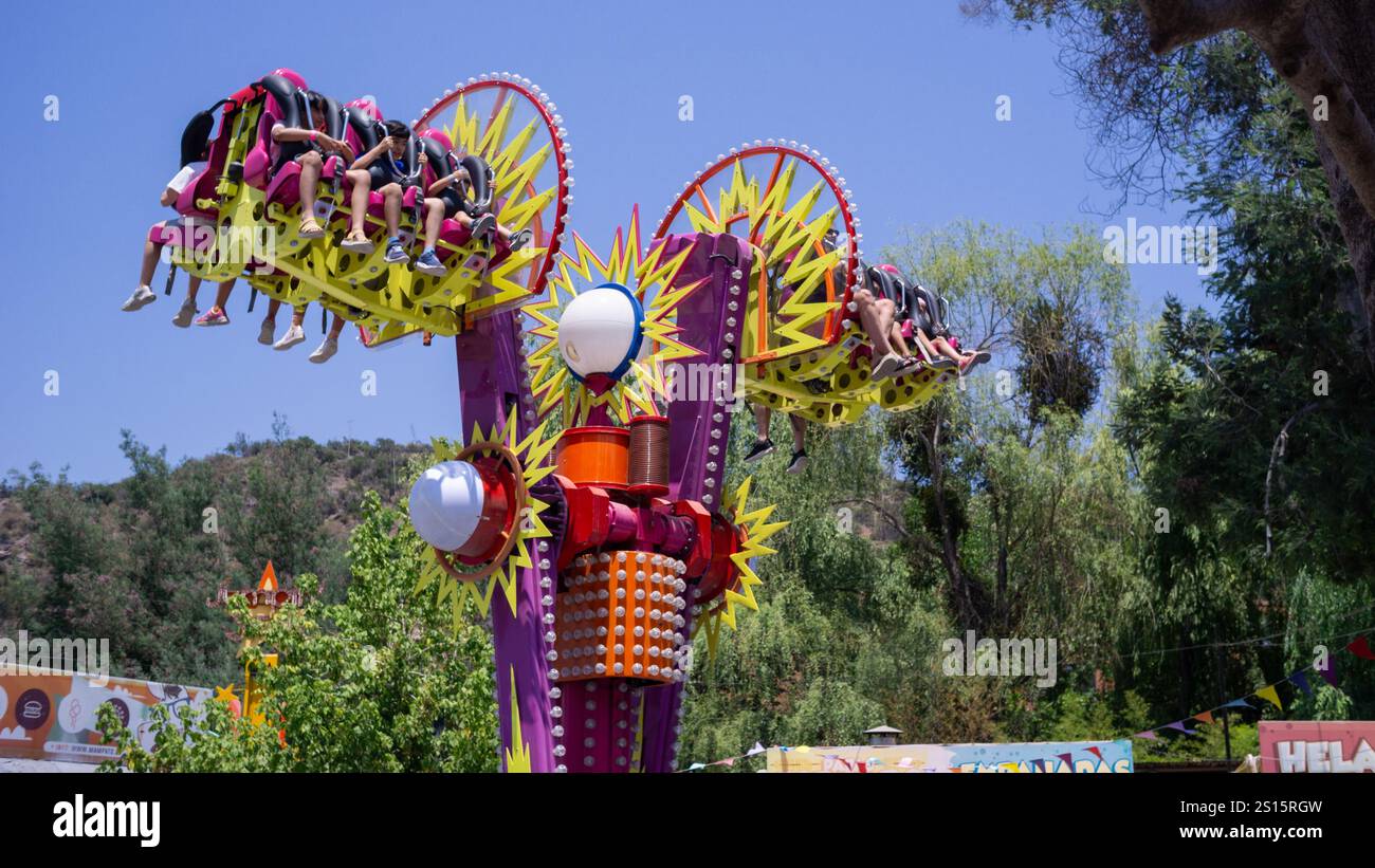 children palying at Mampato Amusement Park in Santiago, Chile during a ...