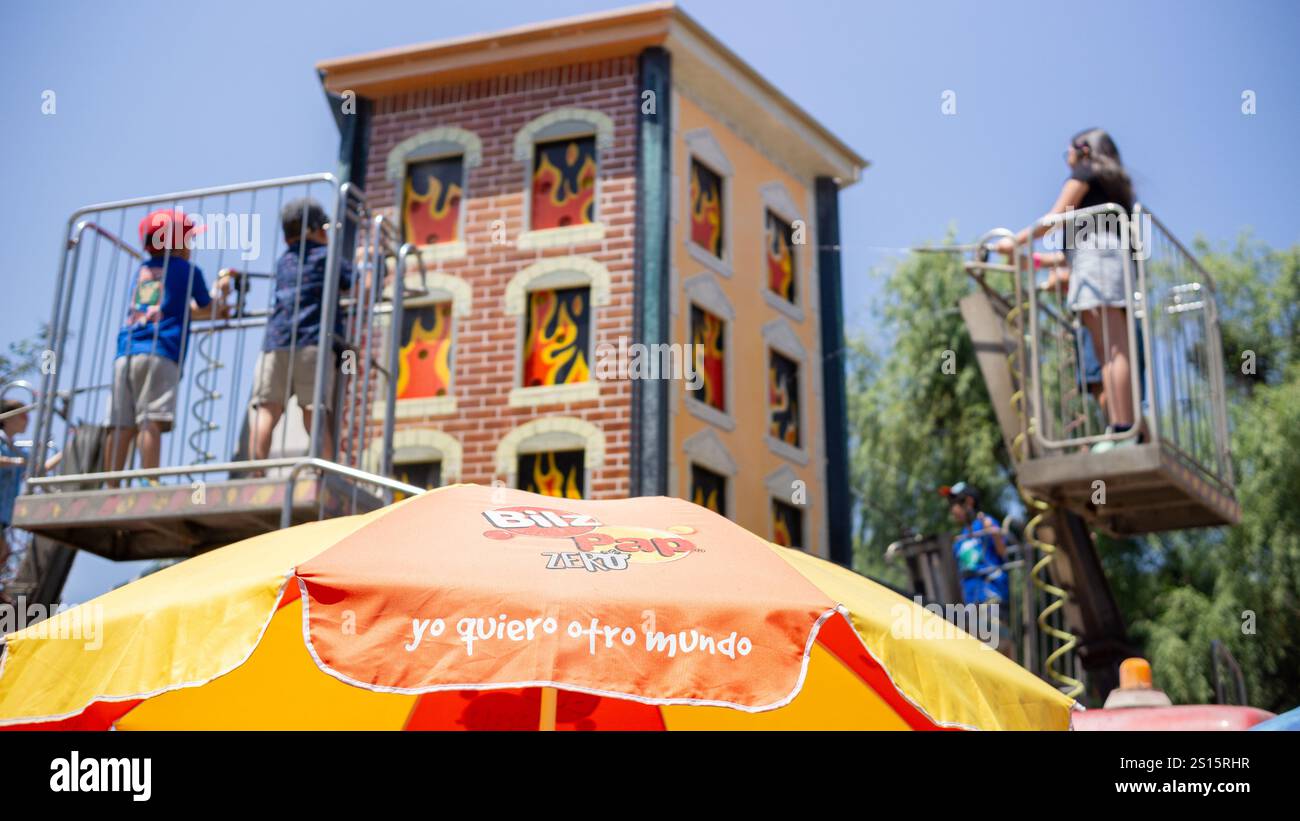 children palying at Mampato Amusement Park in Santiago, Chile during a ...