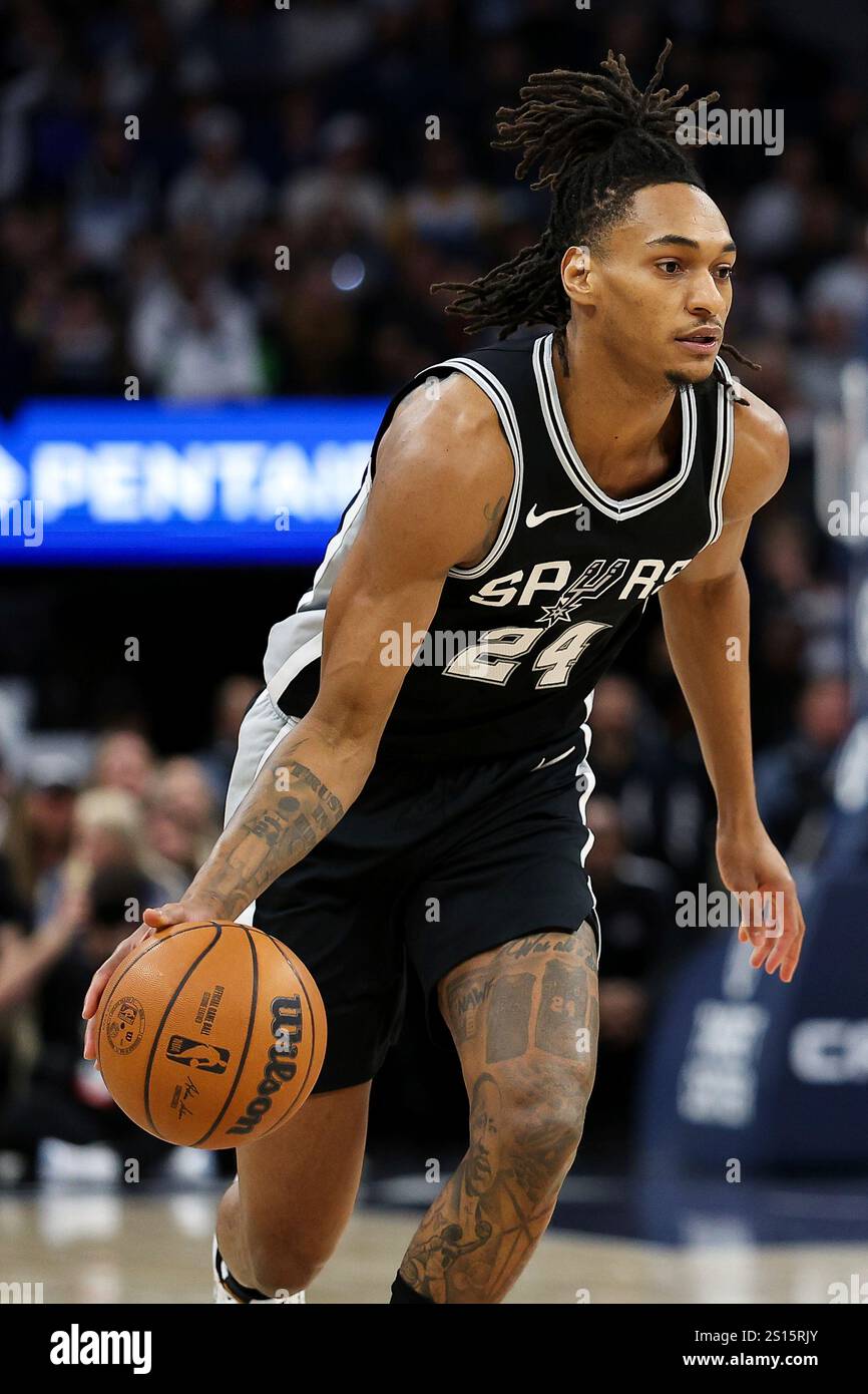 San Antonio Spurs guard Devin Vassell (24) dribbles the ball during the ...