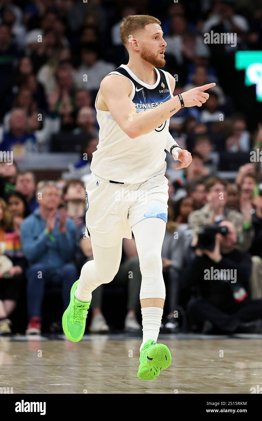 Minnesota Timberwolves guard Donte DiVincenzo (0) reacts as he runs ...