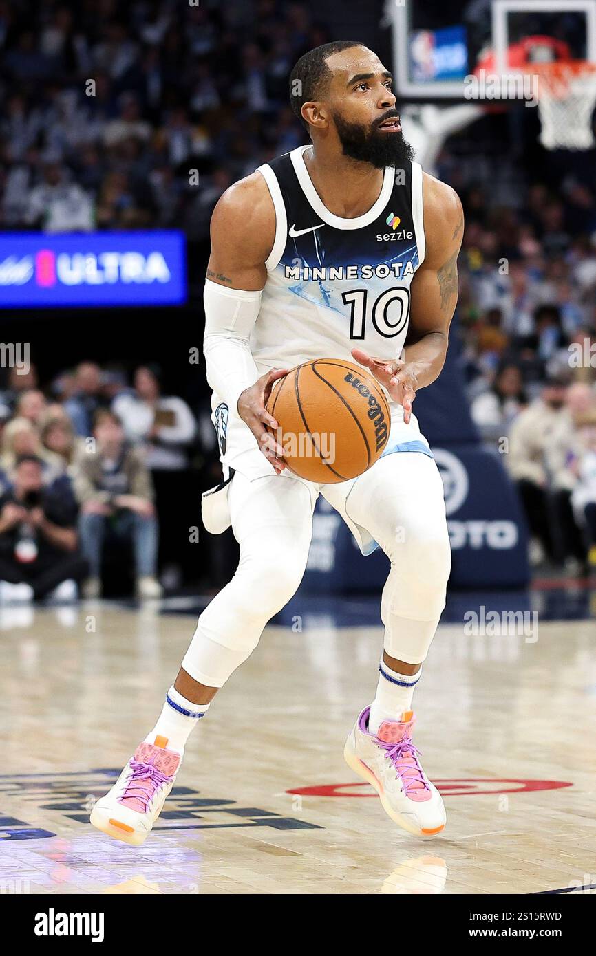 Minnesota Timberwolves guard Mike Conley (10) dribbles the ball during ...