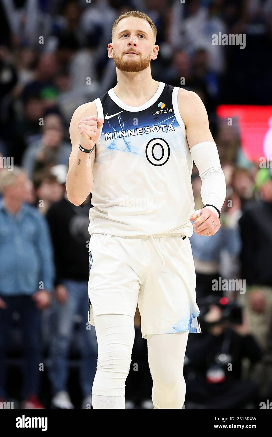 Minnesota Timberwolves guard Donte DiVincenzo (0) celebrates his teams ...