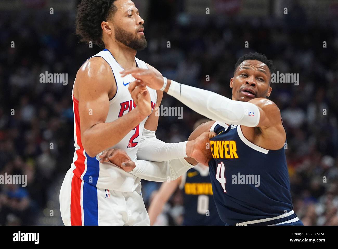 Detroit Pistons guard Cade Cunningham (2) and Denver Nuggets guard ...