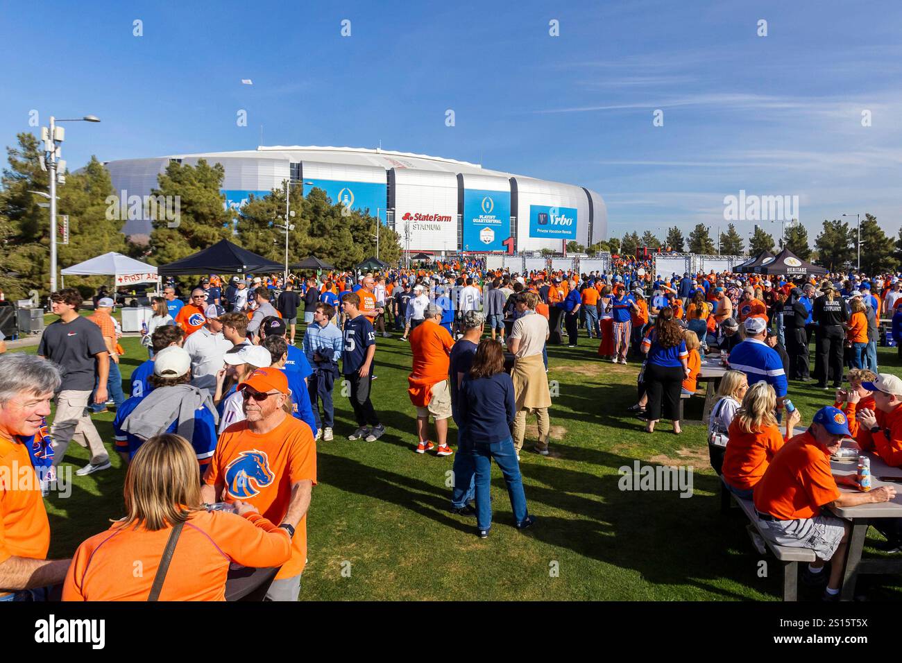GLENDALE, AZ - DECEMBER 31: Boise State fans gather in the fan fest zone prior to the Vrbo ...