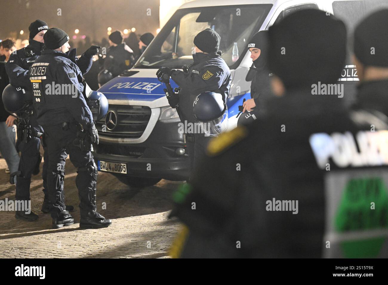 Stuttgart, Germany. 31st Dec, 2024. Police officers secure a New Year's ...