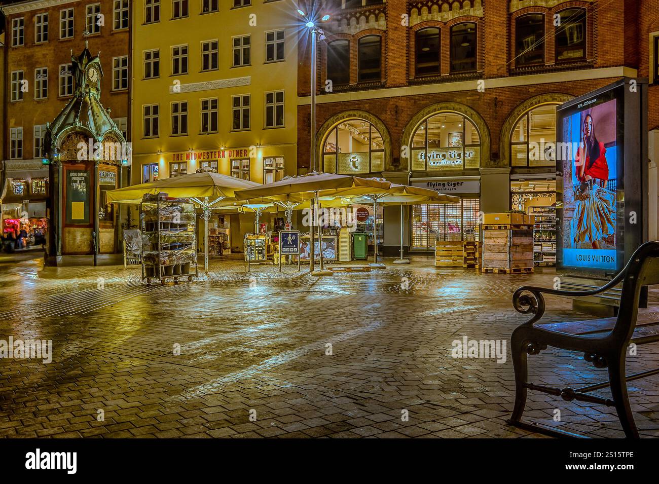 Kultorvet in Copenhagen at night with colourful reflective neon signs ...