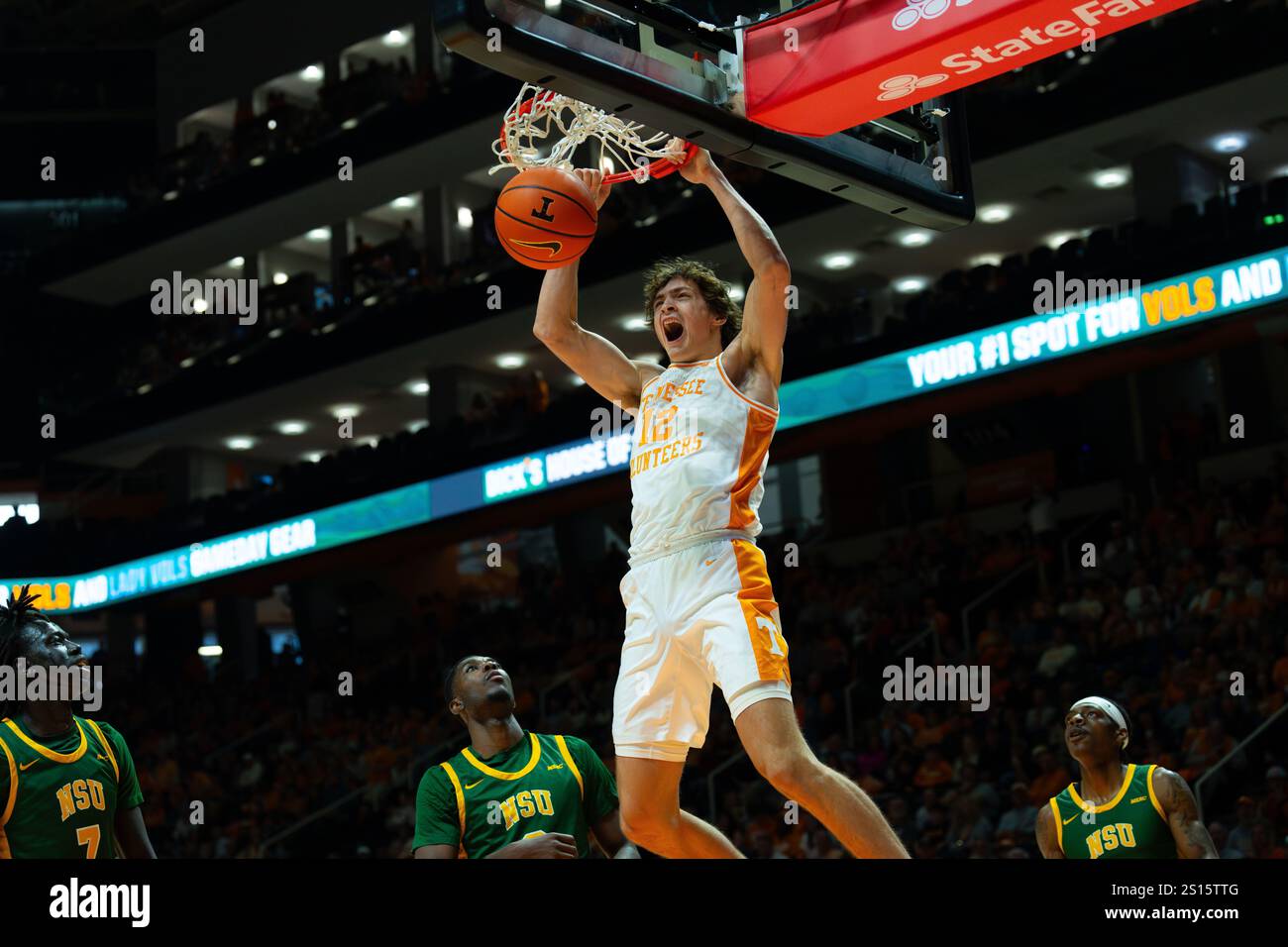 December 31, 2024: Cade Phillips #12 of the Tennessee Volunteers dunks ...