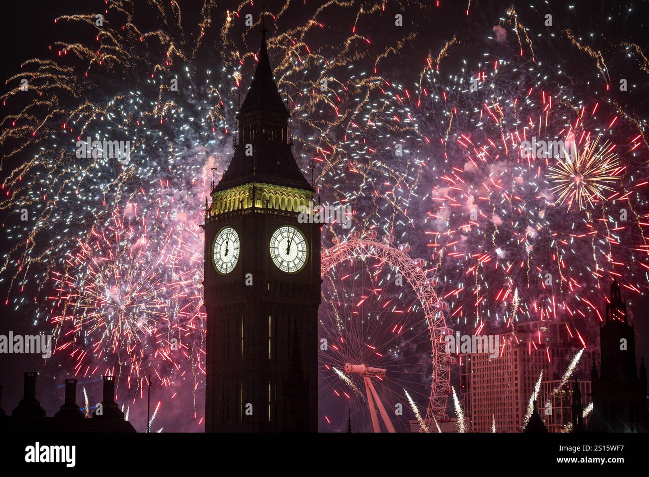 Fireworks light up the sky over Elizabeth Tower, also known as Big Ben ...