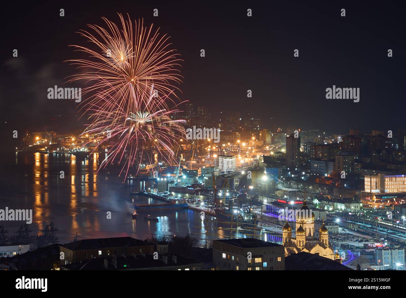 Vladivostok, Russia. 31st Dec, 2024. Fireworks explode in the sky in ...