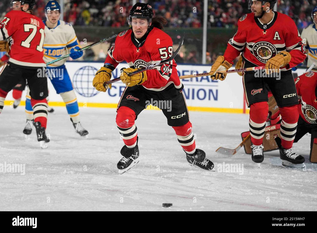 Chicago Blackhawks left wing Tyler Bertuzzi (59) chases the puck during ...