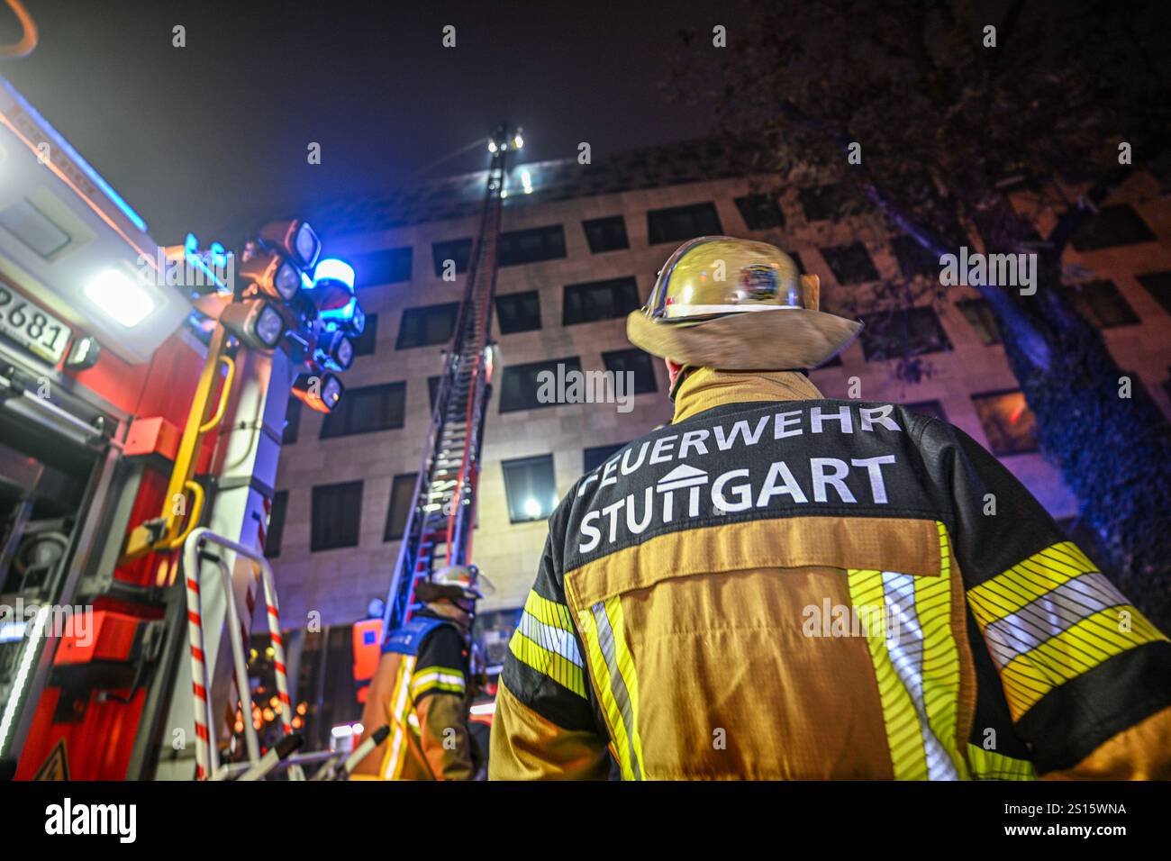 Stuttgart, Germany. 01st Jan, 2025. Firefighters extinguish a fire on a ...