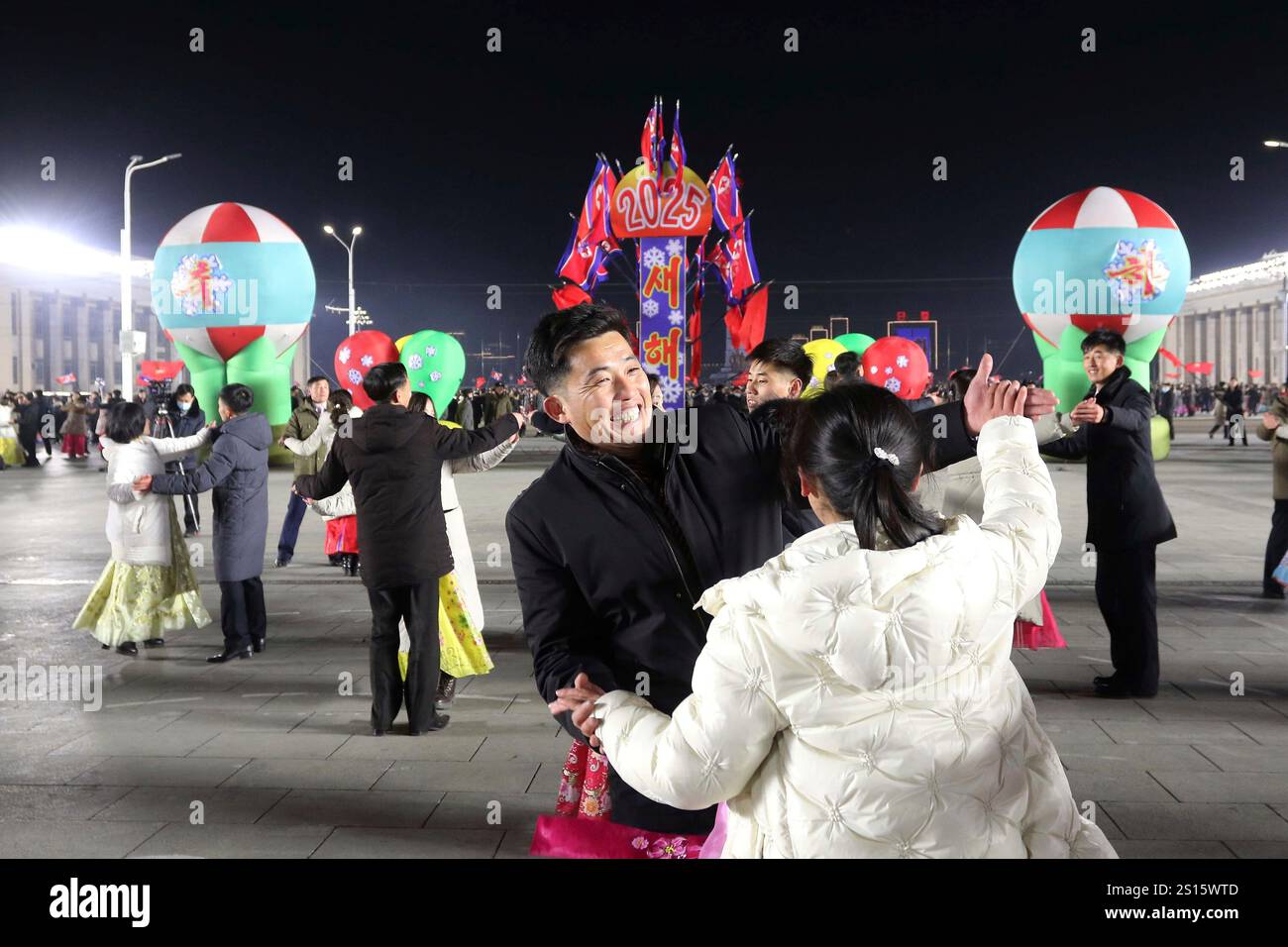 Youth and students dance during a New Year celebration at Kim Il Sung ...