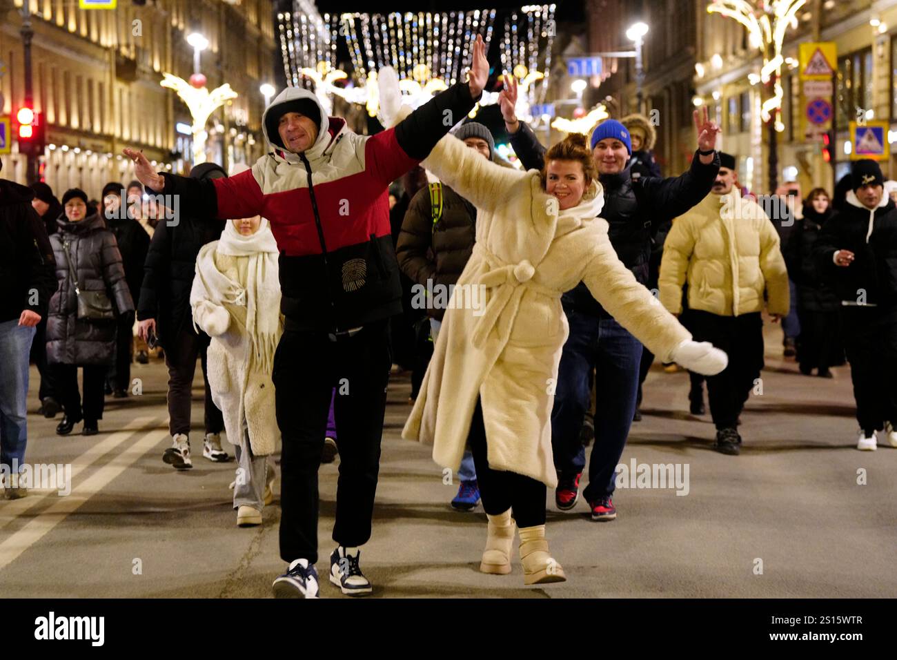 People dance during the New Year's celebrations in central St ...