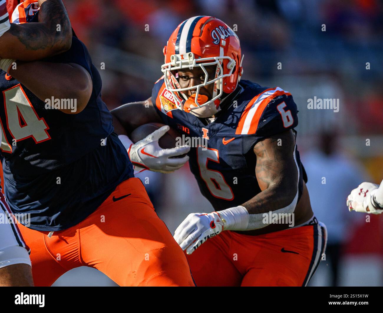 Orlando, FL, USA. 31st Dec, 2024. Illinois Fighting Illini running back ...