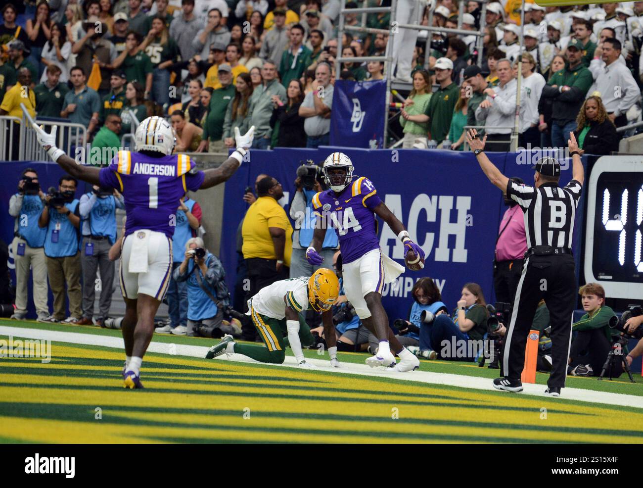HOUSTON, TX - DECEMBER 31: LSU Tigers WR Trey'Dez Green (14) scores a touchdown during the ...
