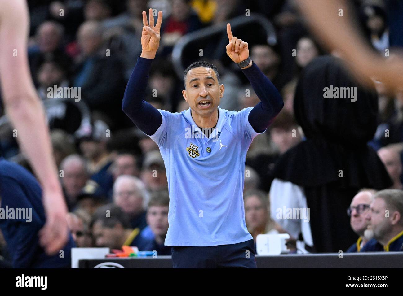 Marquette head coach Shaka Smart gestures in the first half of an NCAA ...