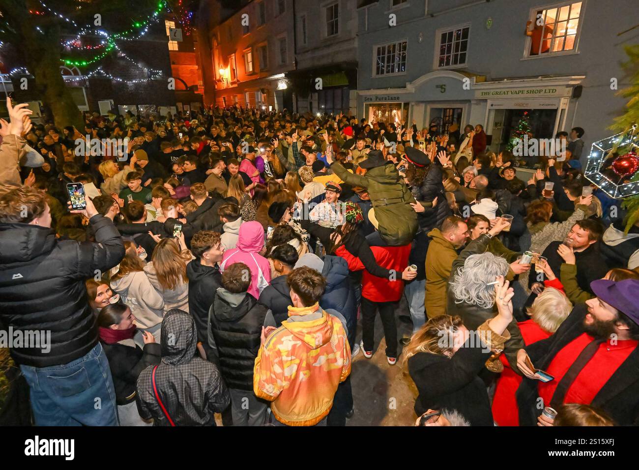 Bridport, Dorset, UK. 1st January 2025. Revellers pack Bucky Doo Square ...