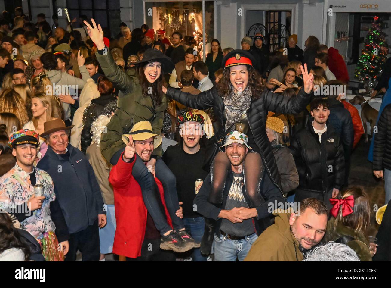 Bridport, Dorset, UK. 1st January 2025. Revellers pack Bucky Doo Square ...