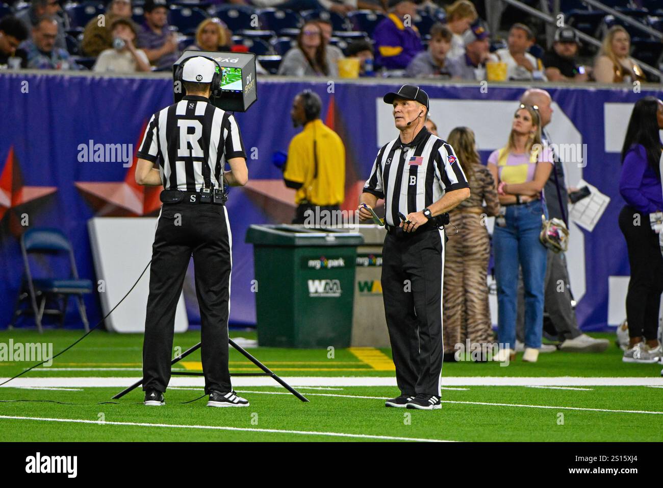 HOUSTON, TX - DECEMBER 31: Referee Justin Elliot looks at a 4th quarter ...