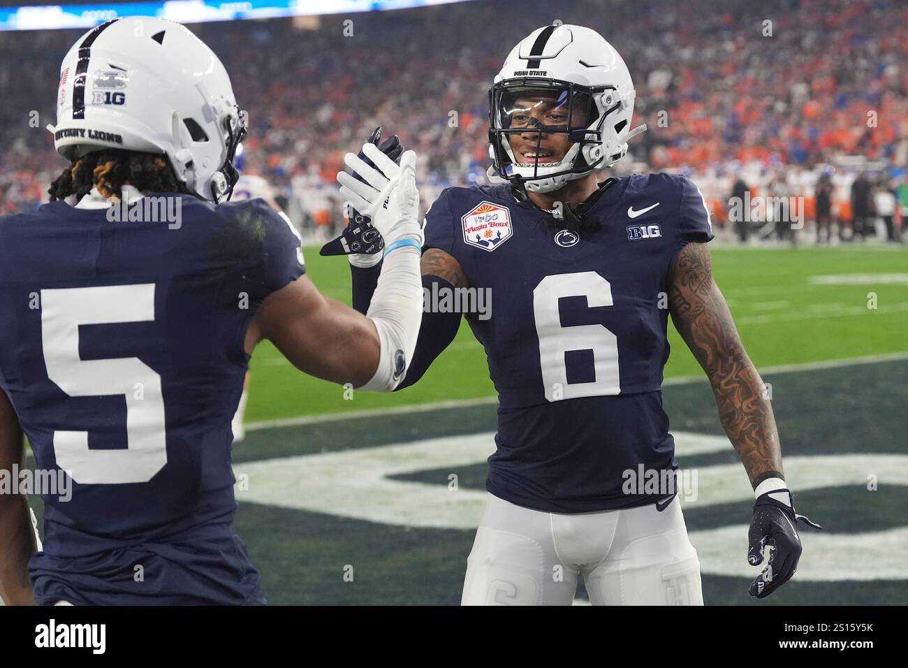 Penn State wide receiver Omari Evans (5) celebrates his touchdown ...