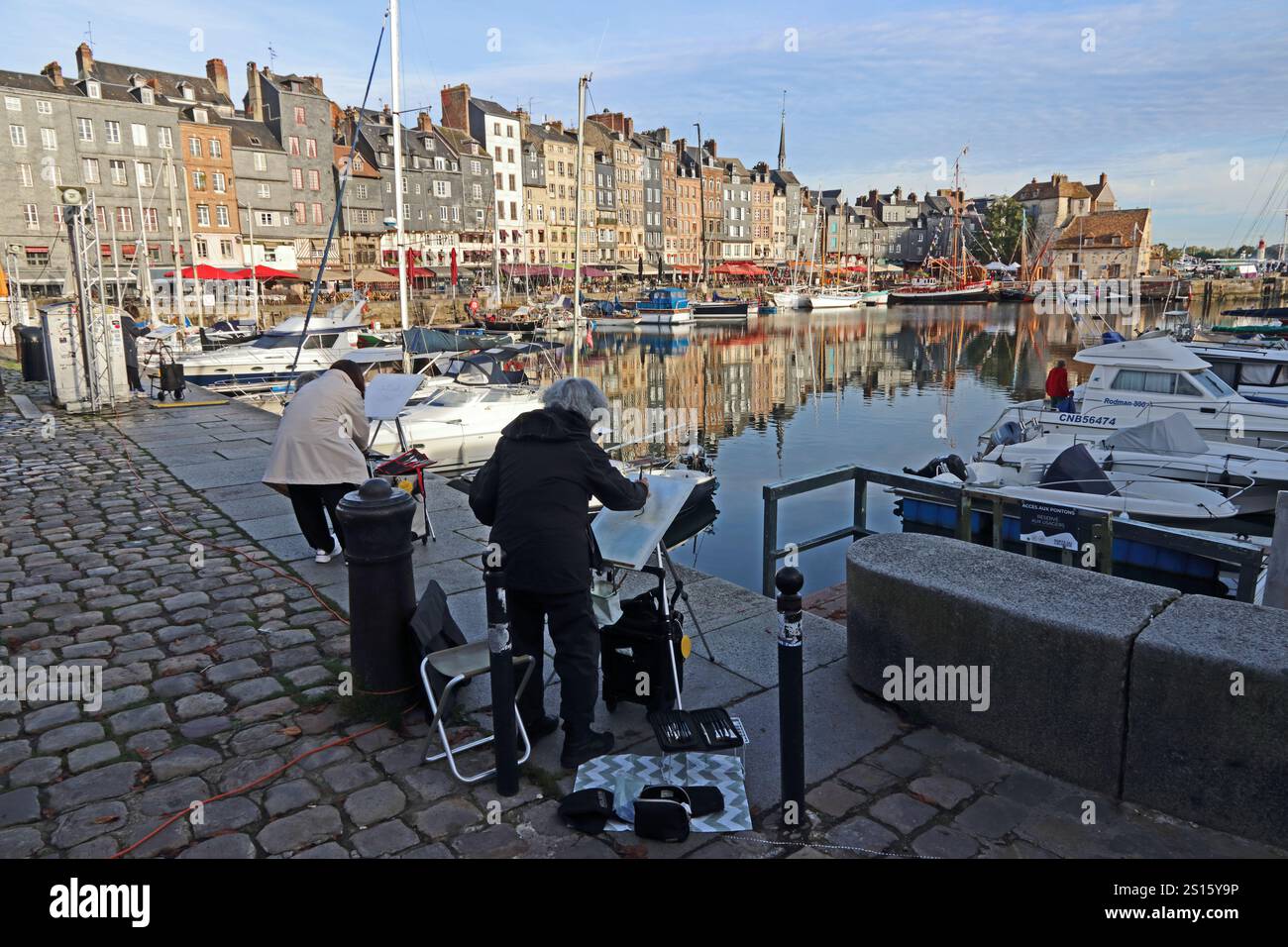 Artists painting scenes of Vieux-Bassin (old Harbour), Honfleur Stock ...