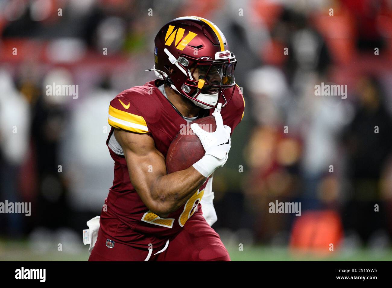 Washington Commanders running back Jeremy McNichols (26) works out ...