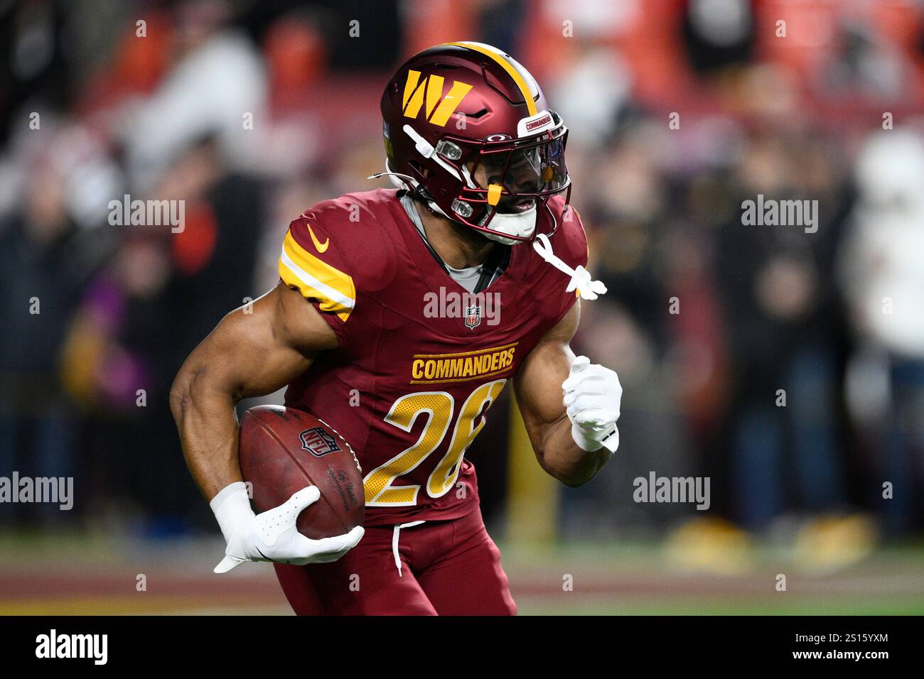 Washington Commanders running back Jeremy McNichols (26) works out ...