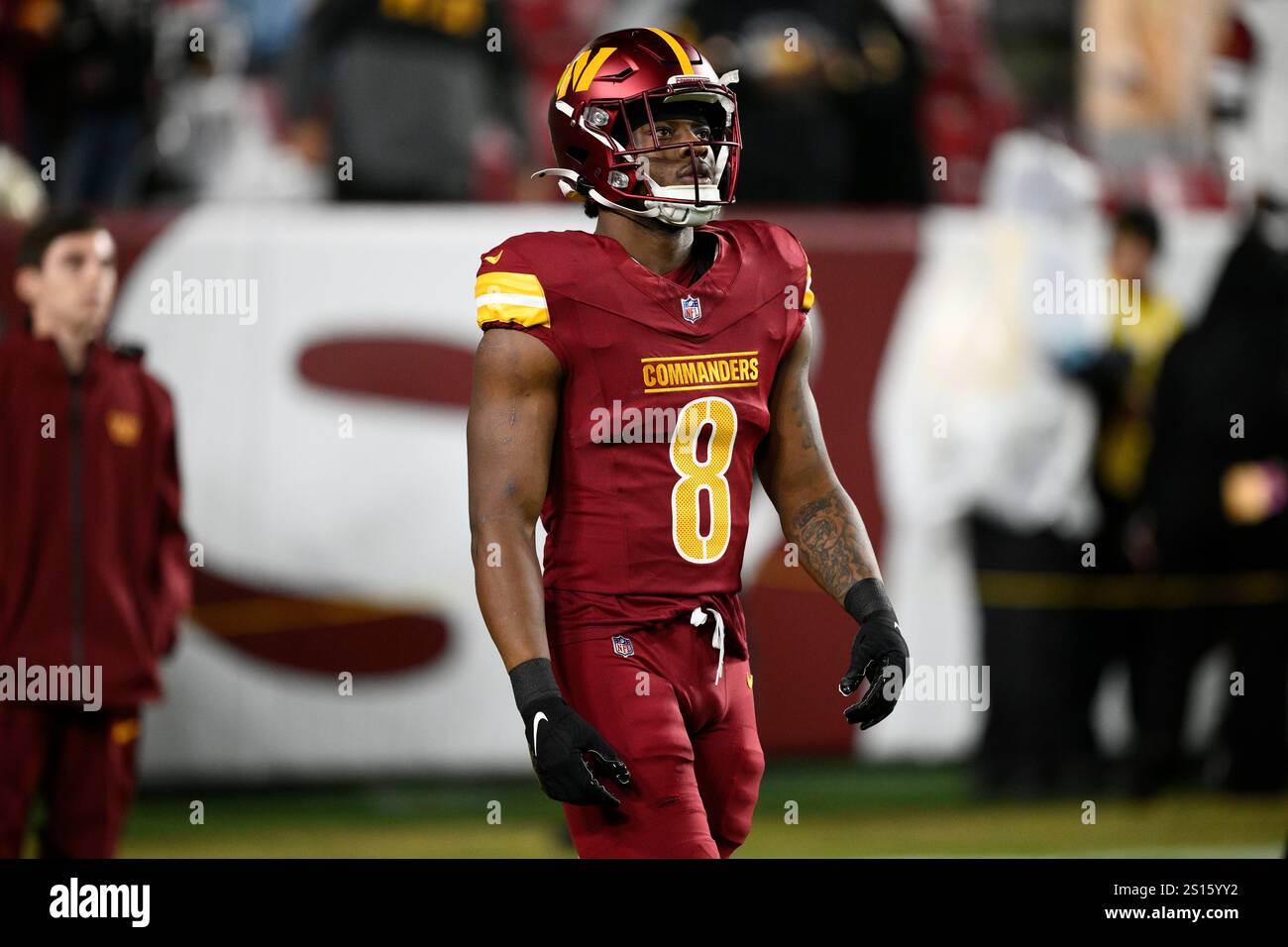 Washington Commanders running back Brian Robinson Jr. (8) works out ...