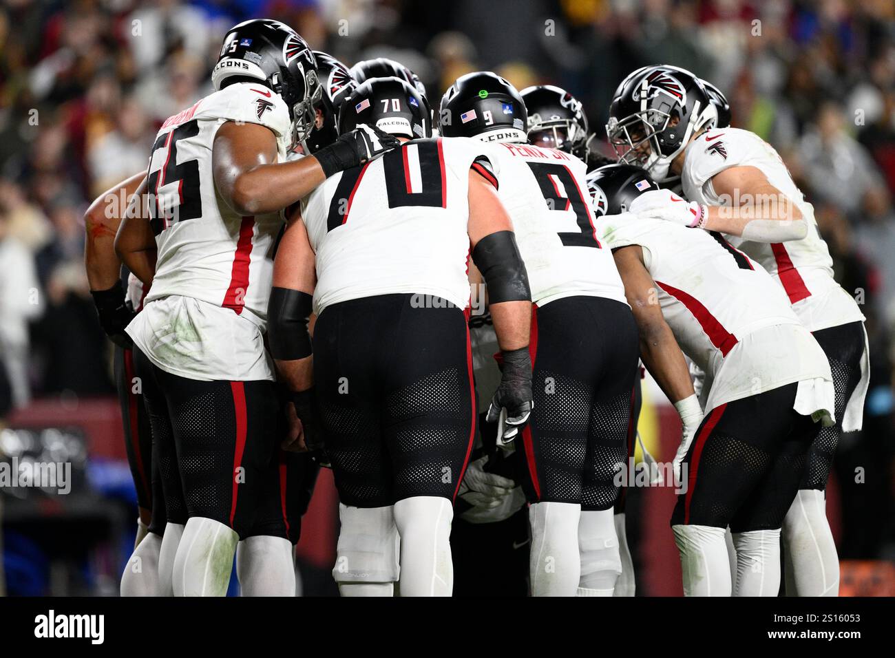 The Atlanta Falcons offense huddle during the first half of an NFL ...