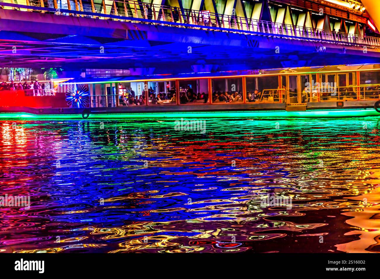 Colorful Tourist Boat Going Under Ferris Wheel Bridge Night Illuminated ...