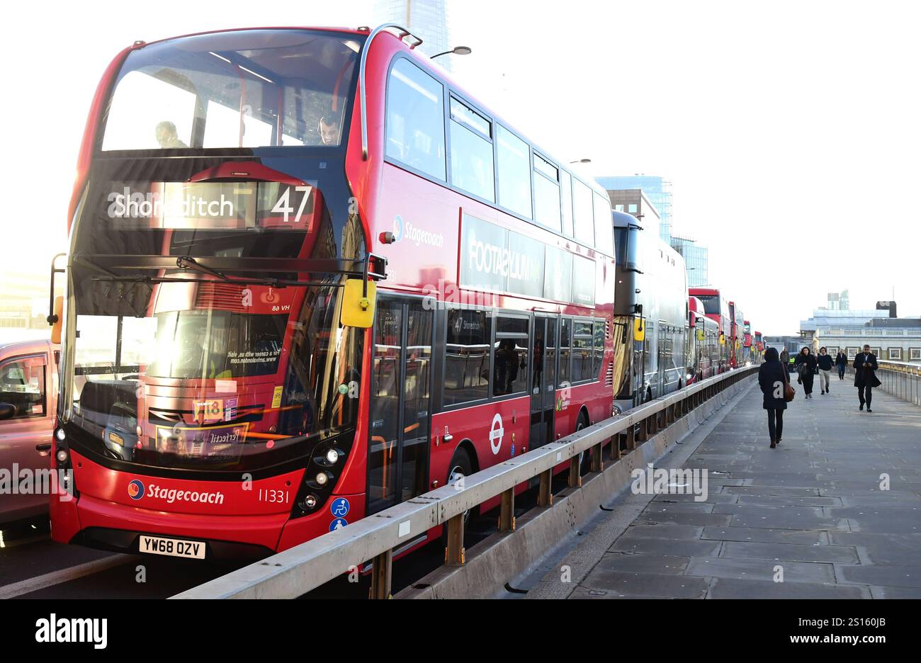 File photo dated 11/12/19 of buses on London Bridge in London. The ...