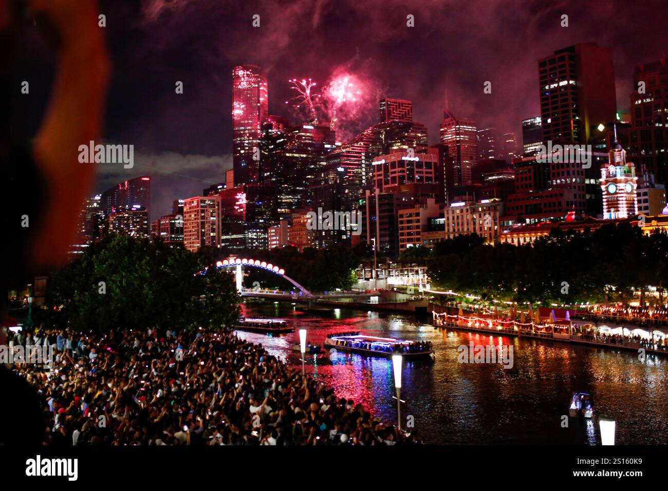 Melbourne, Australia. 31st Dec, 2024. Crowds gather near Melbourne's ...