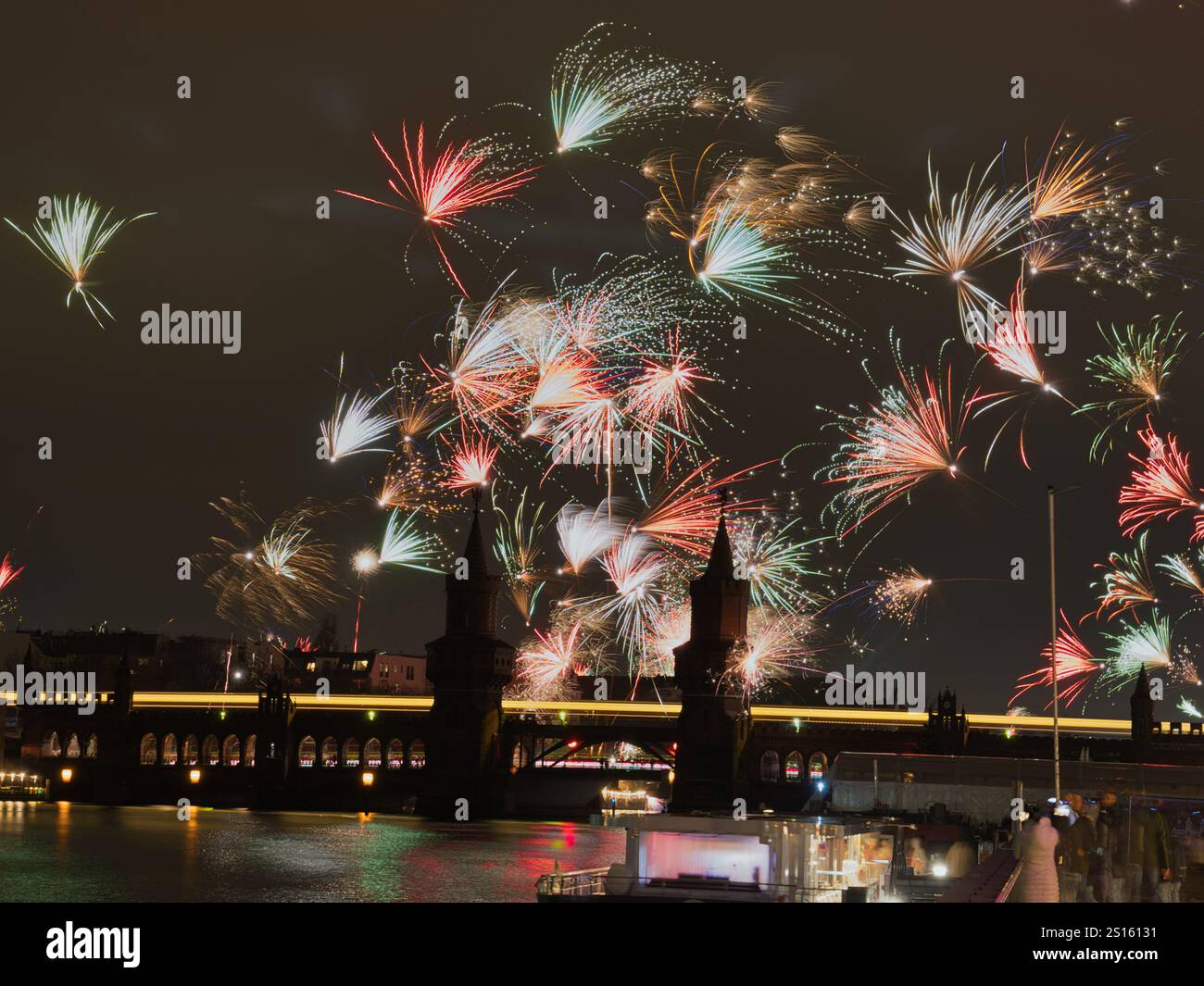 Berlin, Germany. 01st Jan, 2025. Fireworks go off into the night sky ...