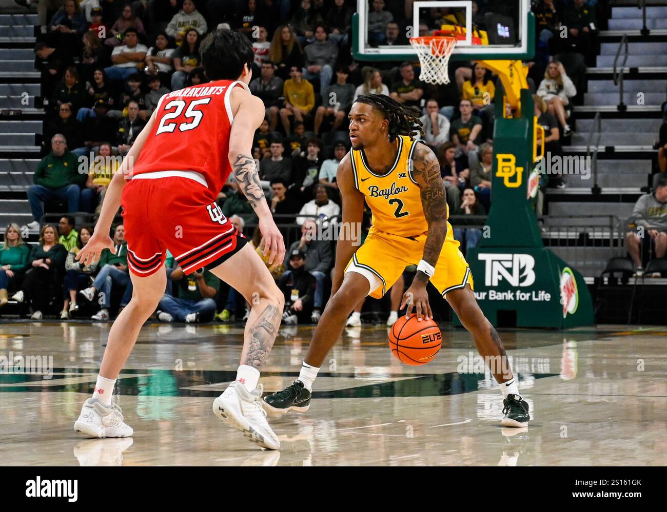 January 31 2024: Utah Utes guard Mike Sharavjamts (25) guards Baylor ...