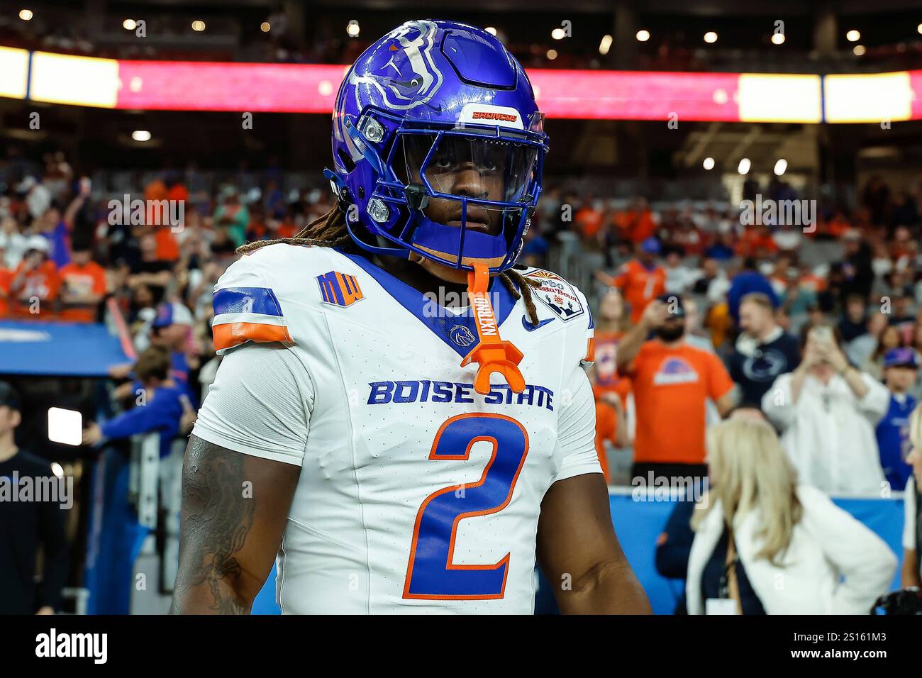 GLENDALE, AZ - DECEMBER 31: Running Back Ashton Jeanty #2 of the Boise State Broncos warms up ...