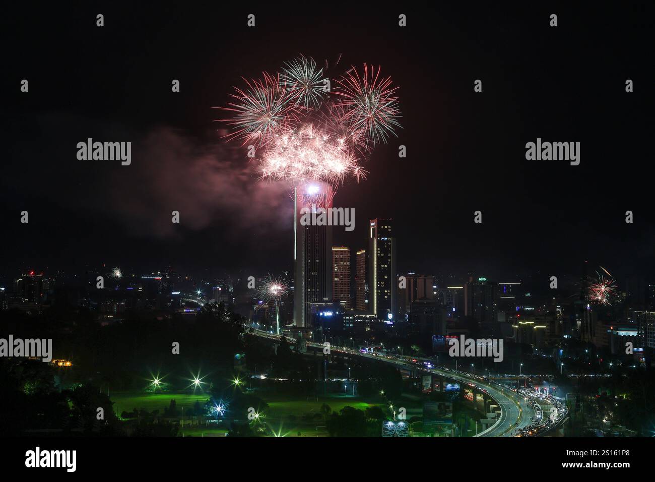 Nairobi, Kenya. 31st Dec, 2024. Fireworks illuminate the sky over GTC ...