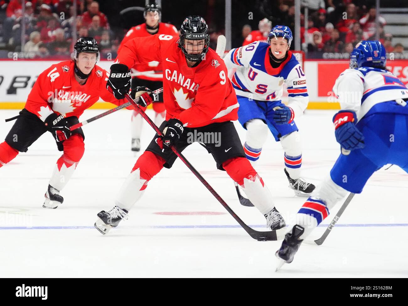 Ottawa, Canada. 31st Dec, 2024. Canada's Gavin McKenna (9) skates with ...