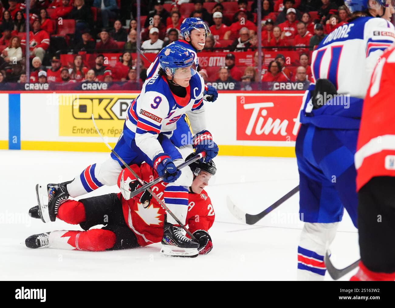 Ottawa, Canada. 31st Dec, 2024. USA's Ryan Leonard (9) scores an empty ...