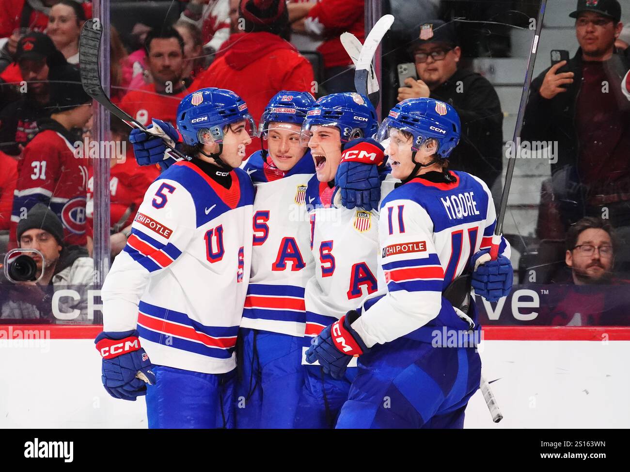 Ottawa, Canada. 31st Dec, 2024. USA's Ryan Leonard (second right ...