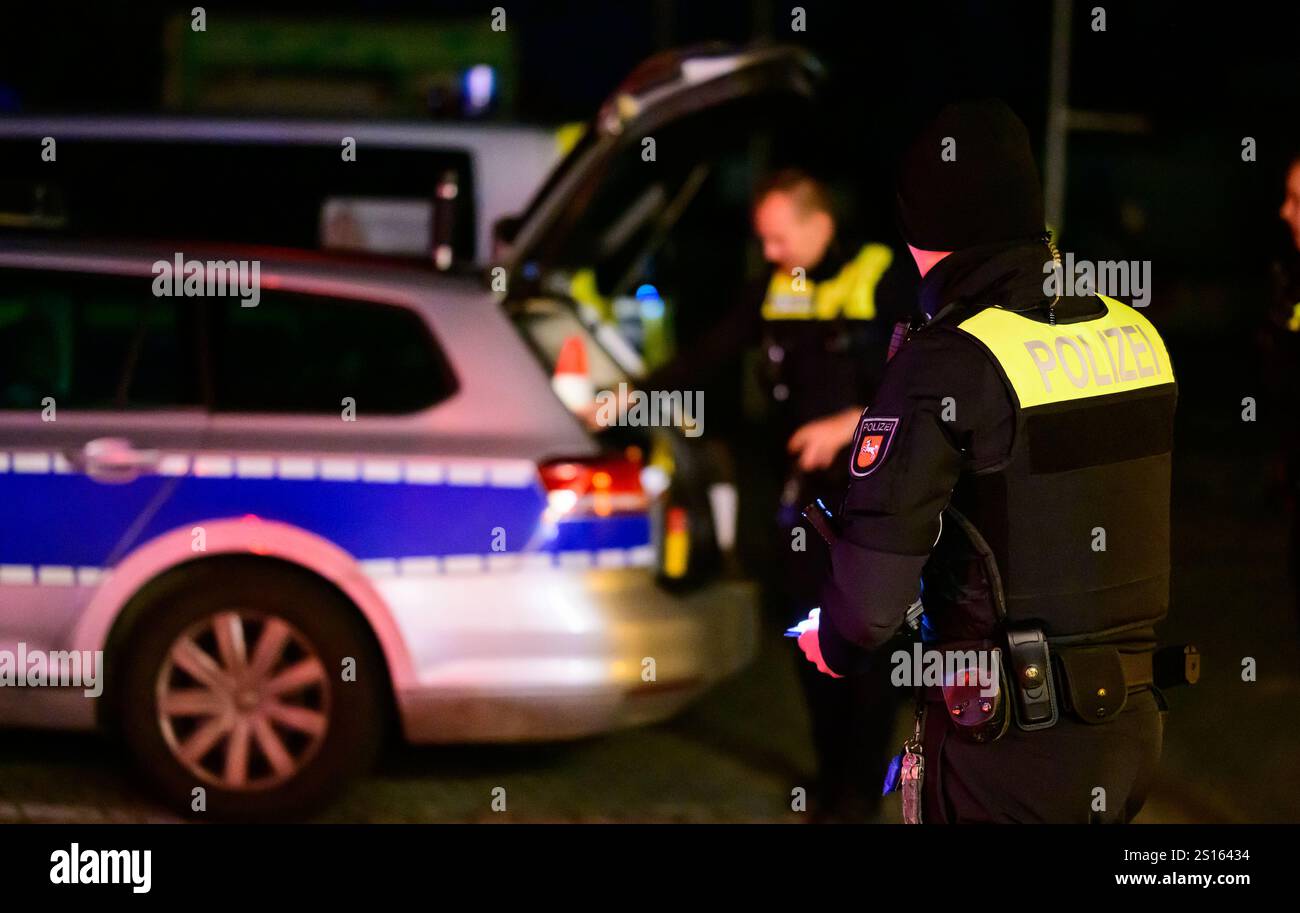 01 January 2025, Lower Saxony, Lüneburg: Police officers are on duty on ...