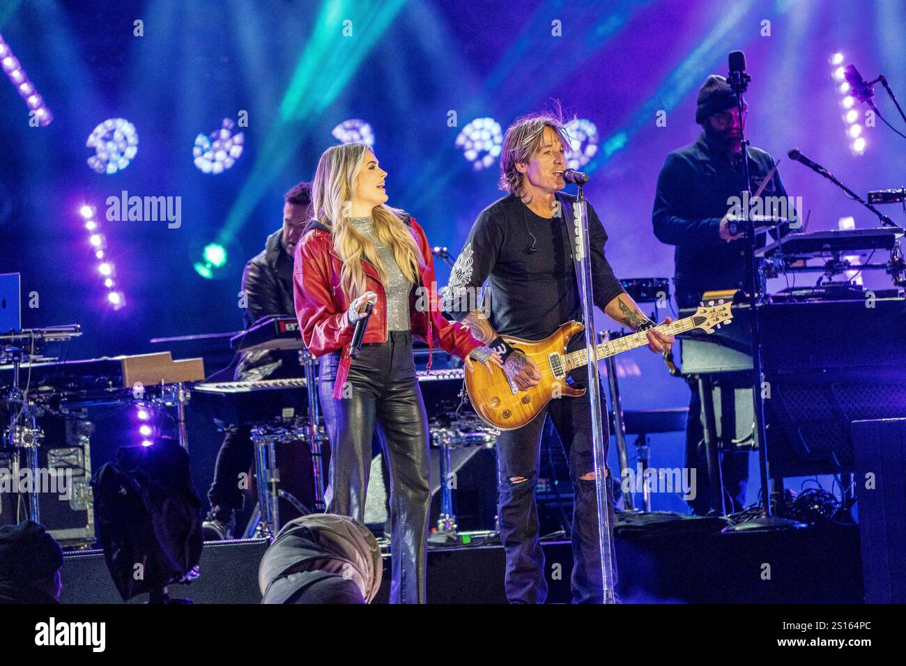 Alana Springsteen, left and Keith Urban perform at Nashville's Big Bash ...