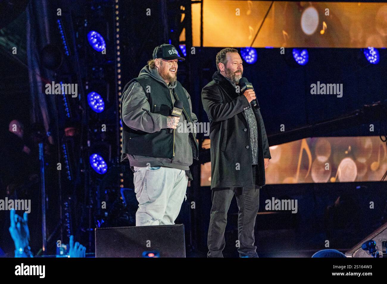Jelly Roll, left and Bert Kreischer perform at Nashville's Big Bash New ...
