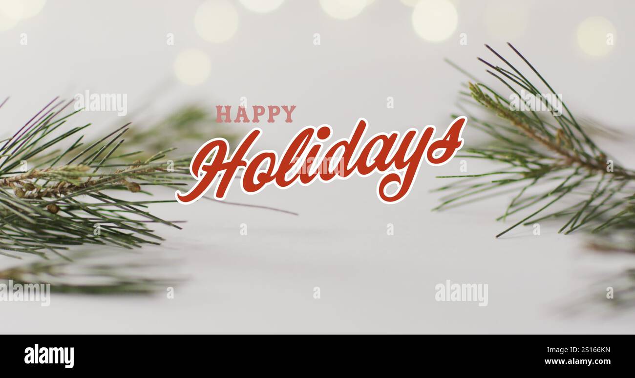 Image of christmas greetings text over christmas tree decorations Stock ...