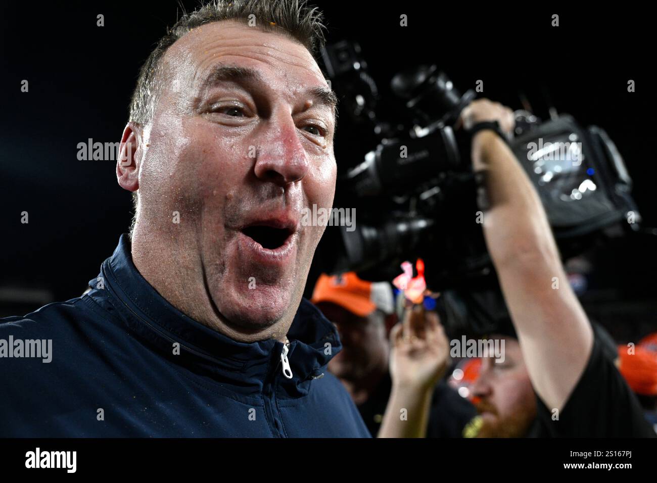 Illinois head coach Bret Bielema reacts on the field after the team's ...