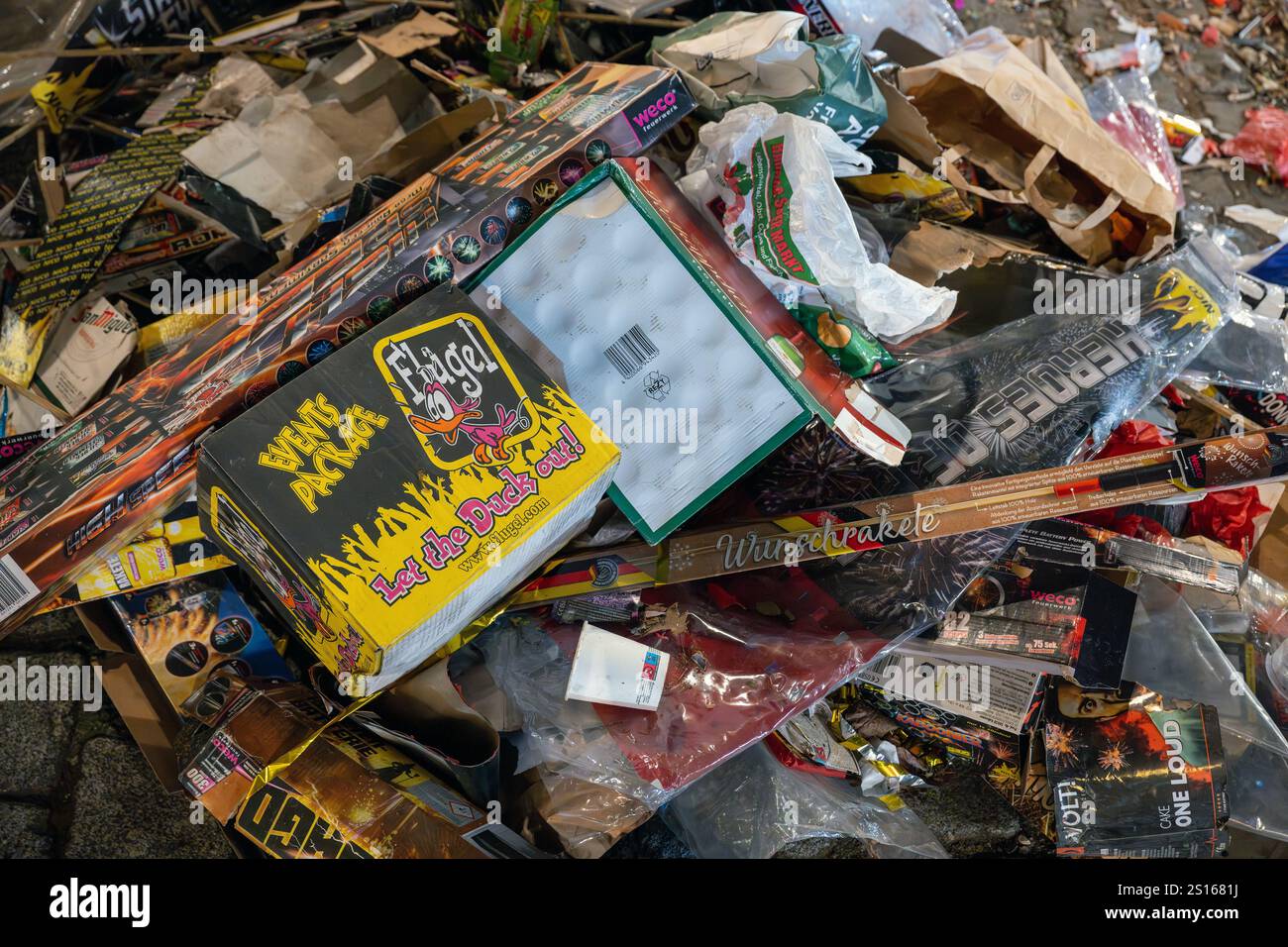 01 January 2025, Berlin: New Year's Eve garbage on Ebertstraße on New ...