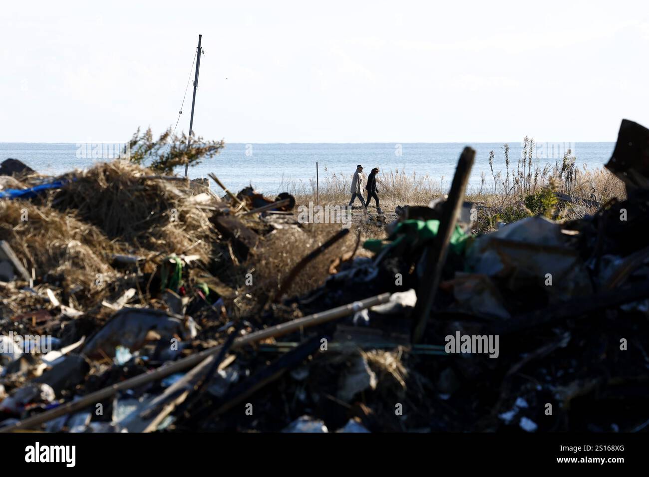 Debris remains near the coast of Suzu, Ishikawa Prefecture, on Jan. 1 ...